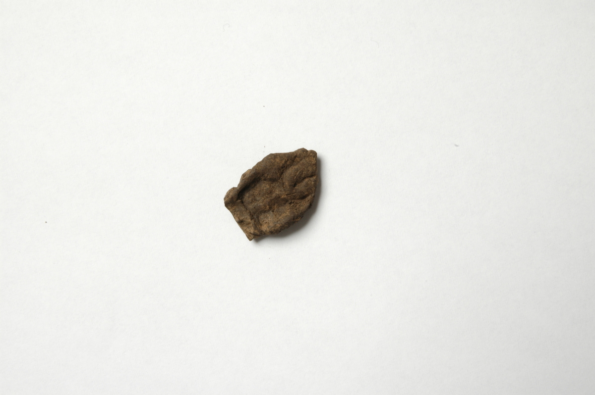 Harpiks med tyggemerker. - Arkeologisk museum, Universitetet i ...