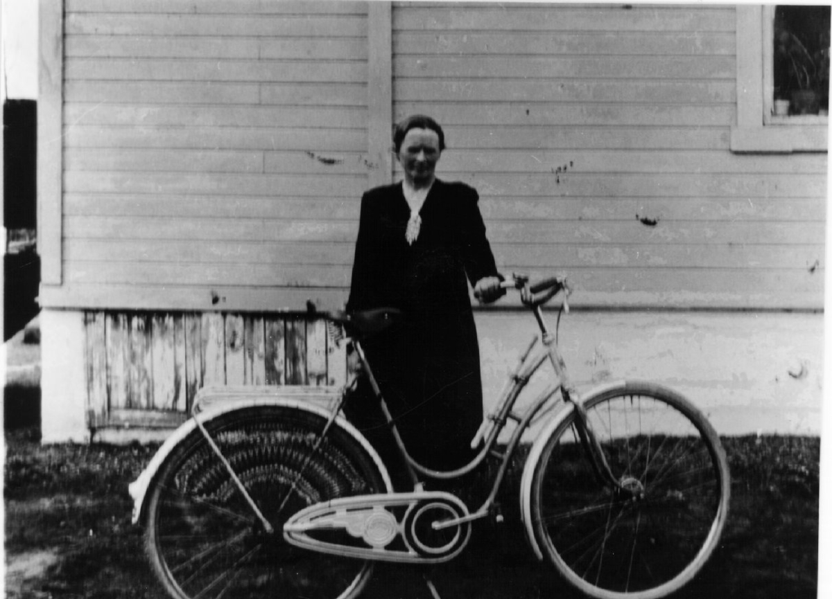 Agnes Johansen med sykkel. Oksvik, Lyngen, ca 1955. - Nord-Troms Museum ...